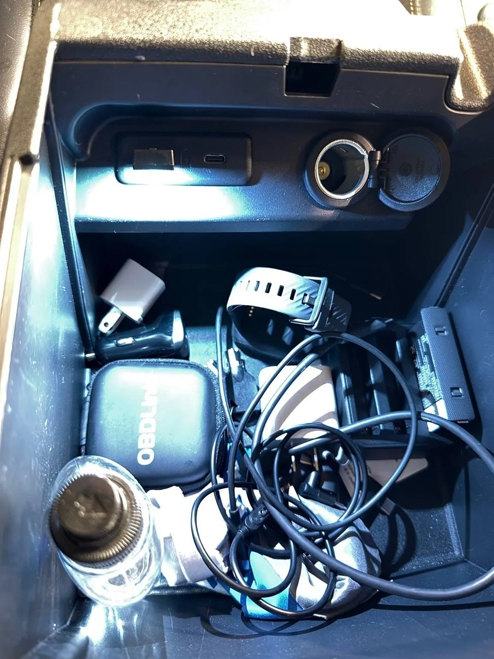 No USB ports in center console just an auxiliary power outlet ...